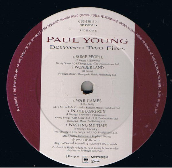 Paul Young ‎– Between Two Fires